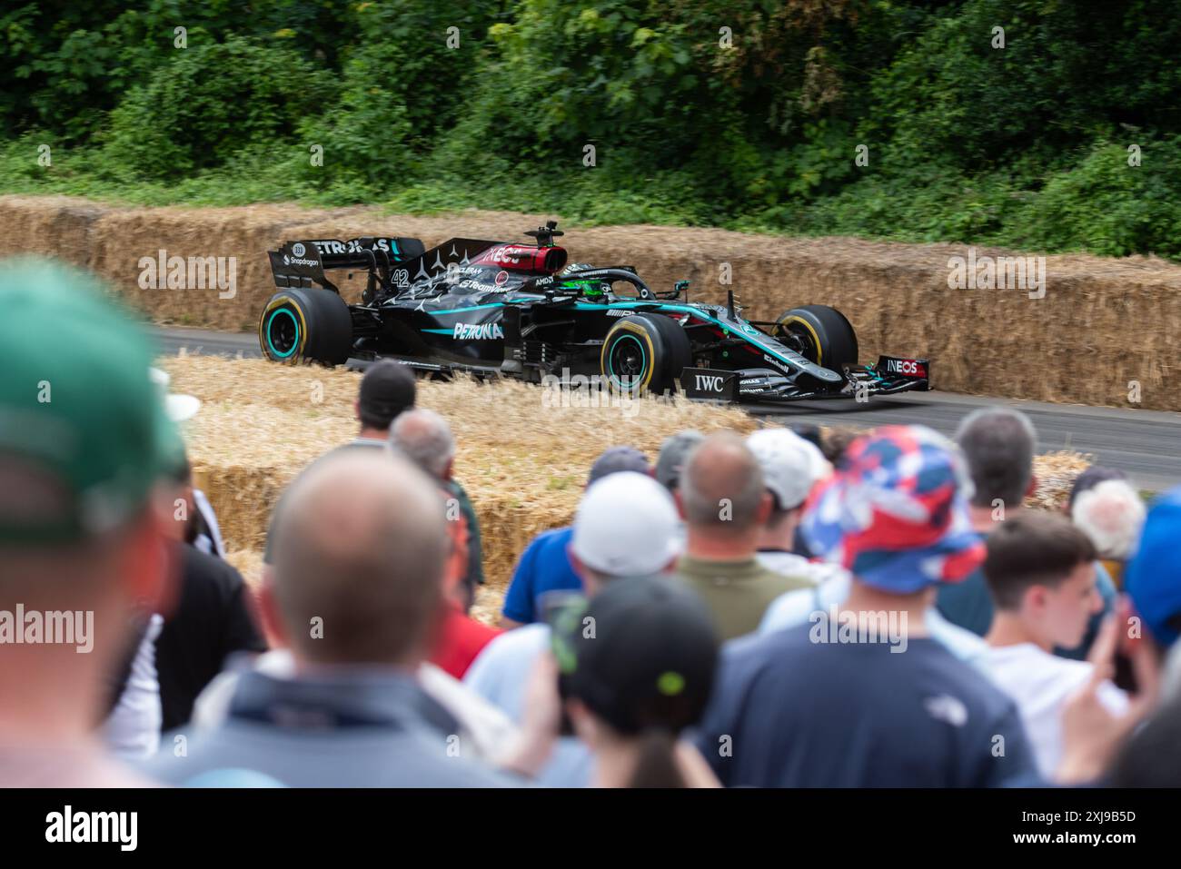 2021 Mercedes-AMG F1 W12 E Performance Formula 1 car driving up the ...