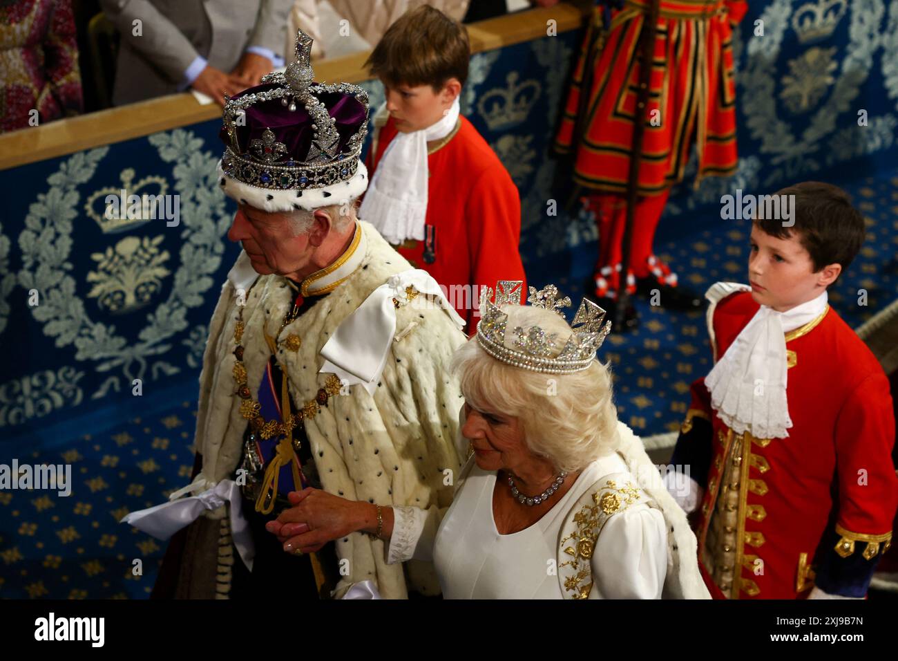 King Charles III, wearing the Imperial State Crown and the Robe of ...