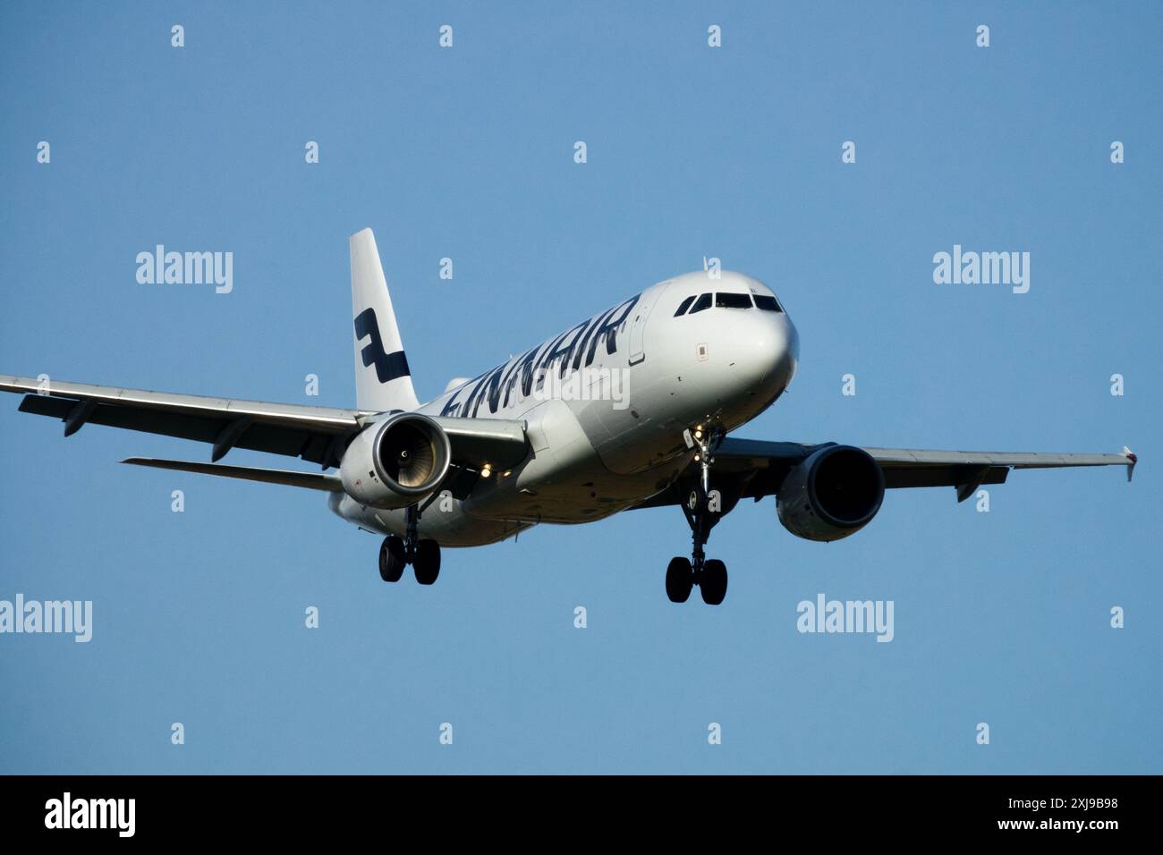 Airbus A320 Finnair Airways Plane Flying in Blue Sky Stock Photo - Alamy