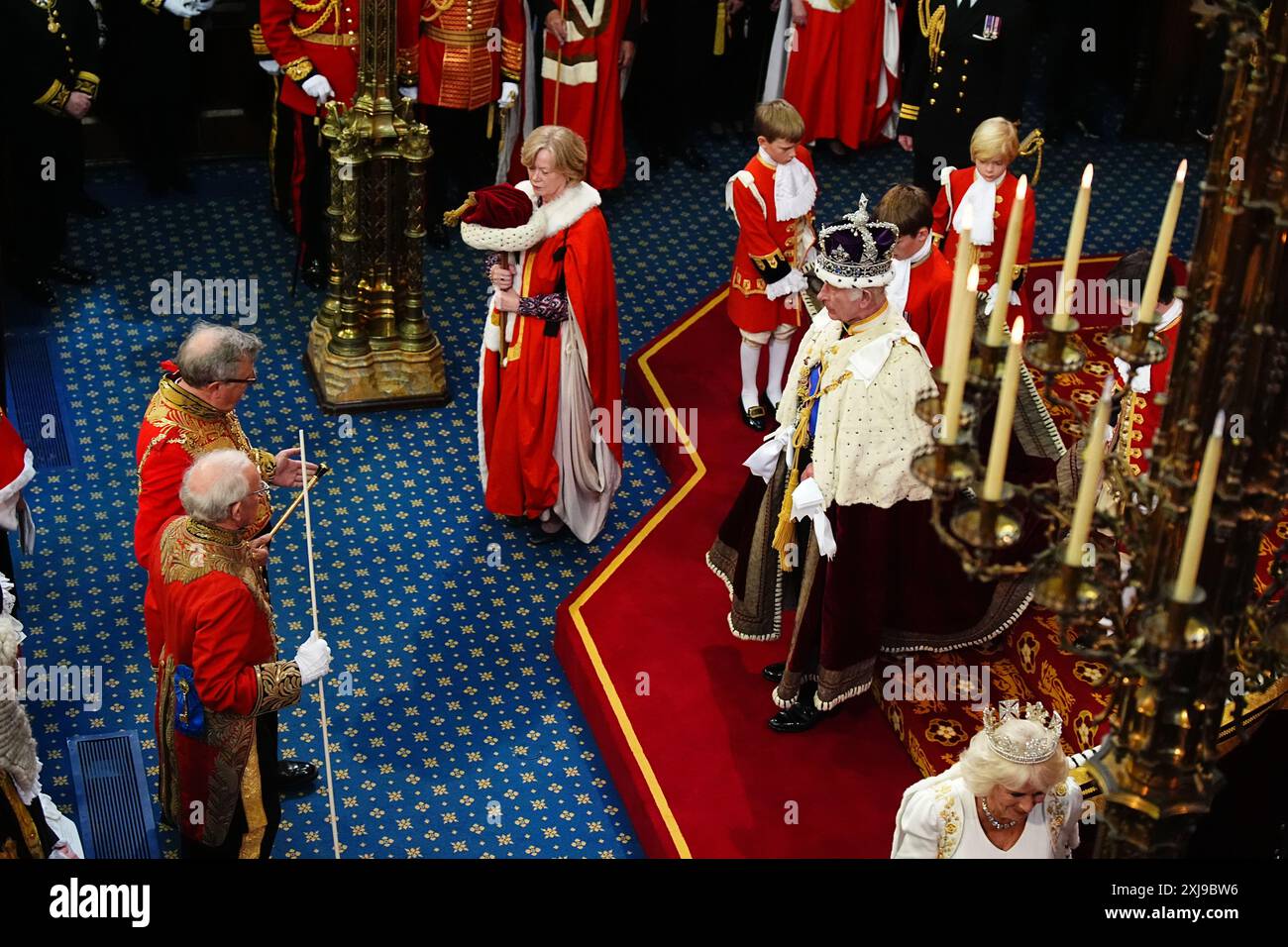 King Charles III, wearing the Imperial State Crown and Robe of State ...