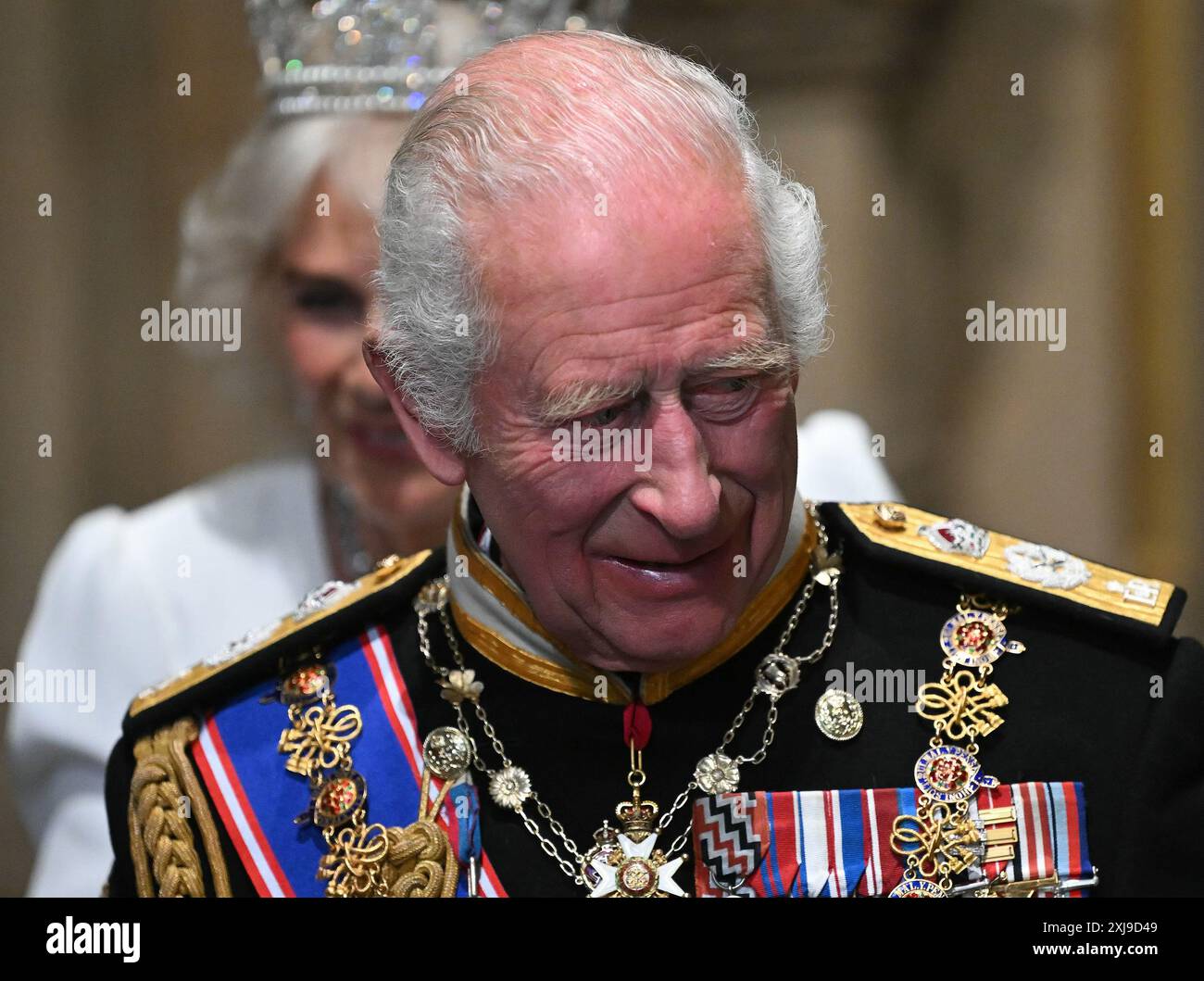 King Charles III wearing the Imperial State Crown leaves via the Norman ...