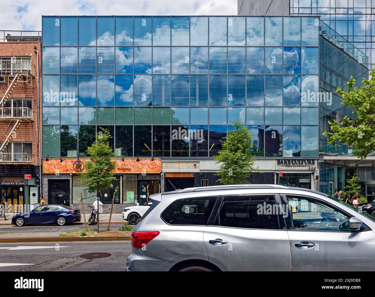 NYC Chinatown: Hotel 50 Bowery, designed in glass by PPA Architects to mirror landmark Citizens ...