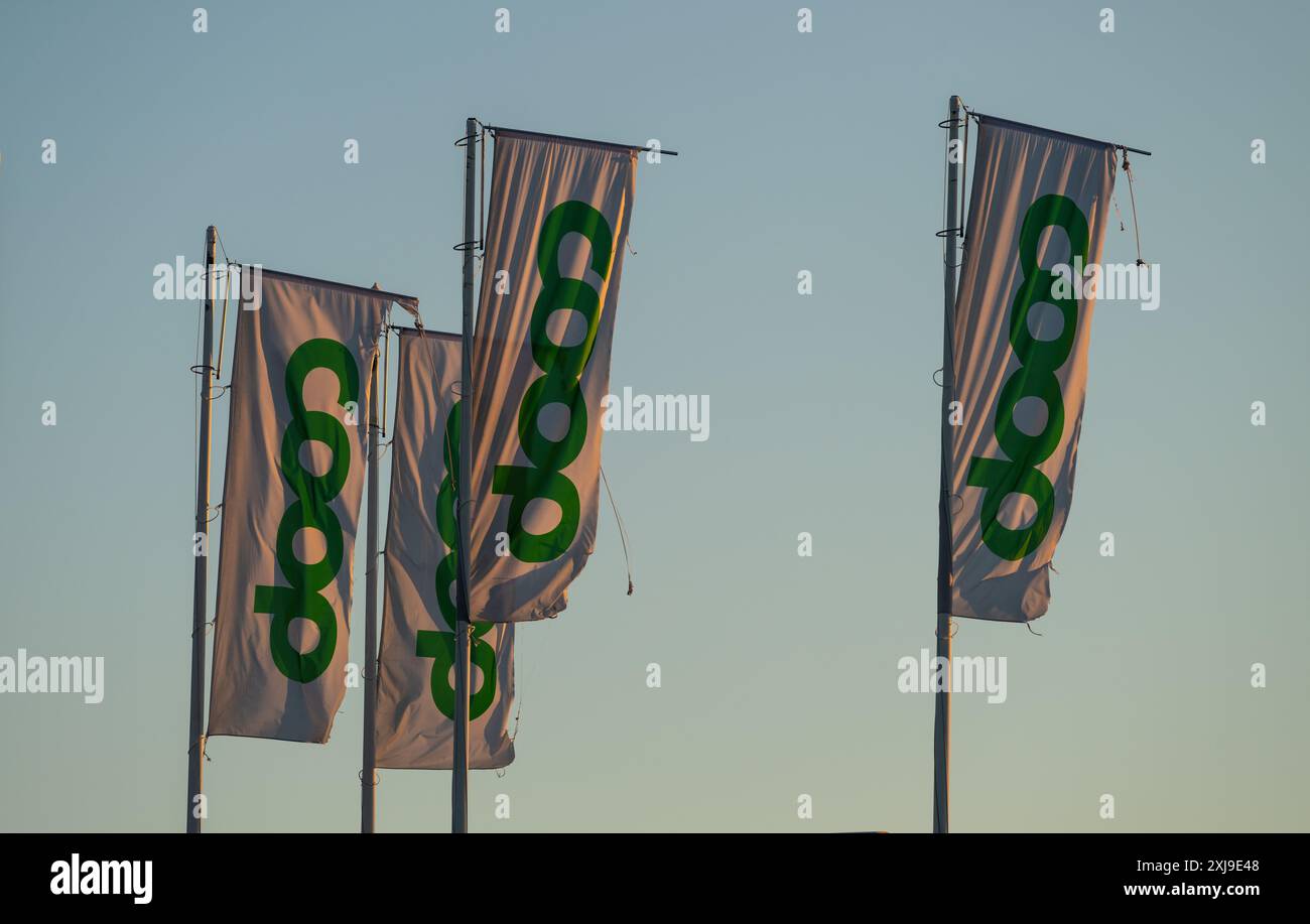 Gothenburg, Sweden - January 06 2024: Coop flags outside a warehouse ...