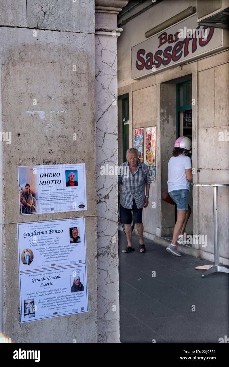 Italian funeral notices stuck on the wall of a building, so local ...