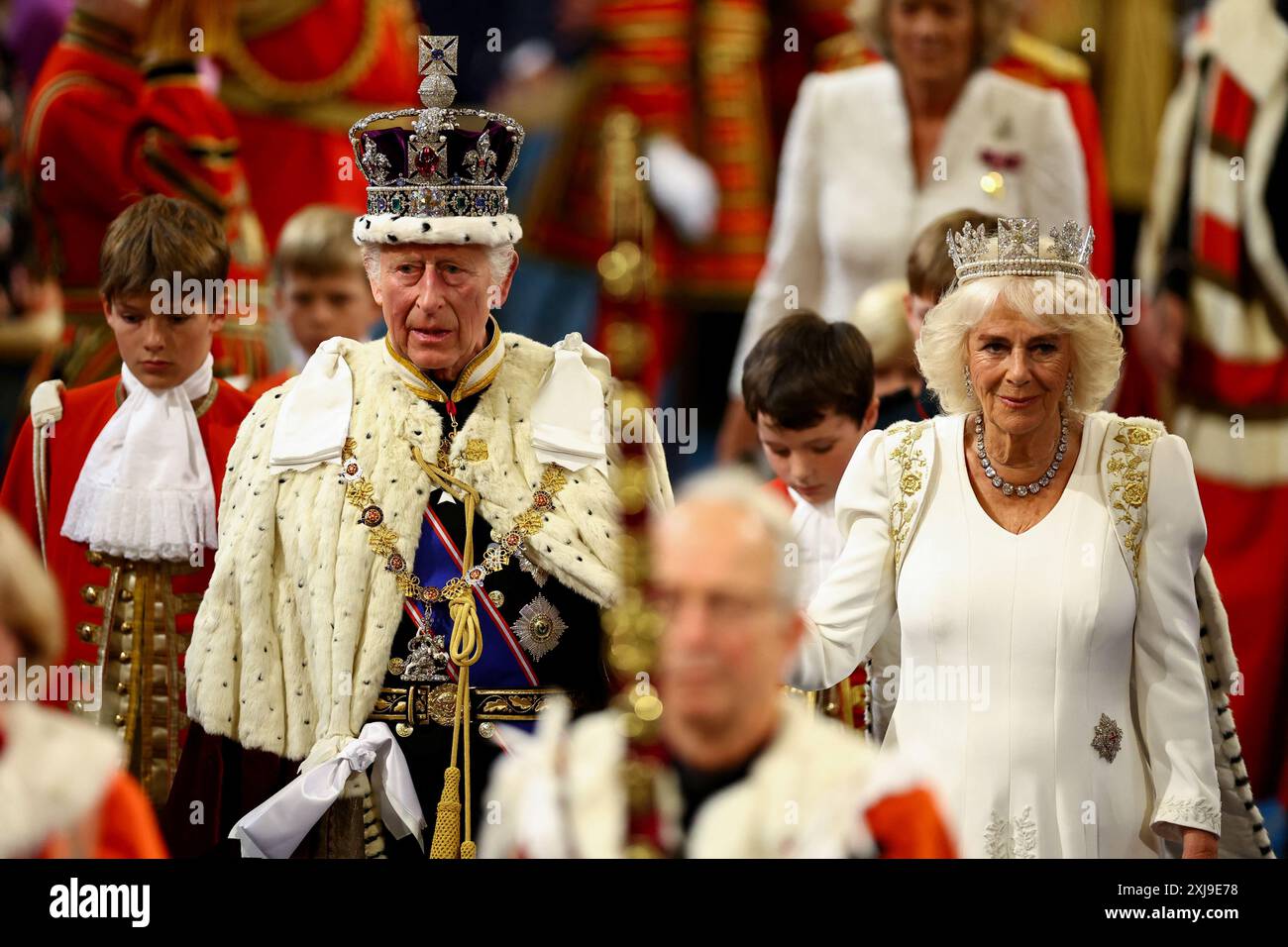 King Charles III, wearing the Imperial State Crown and the Robe of ...