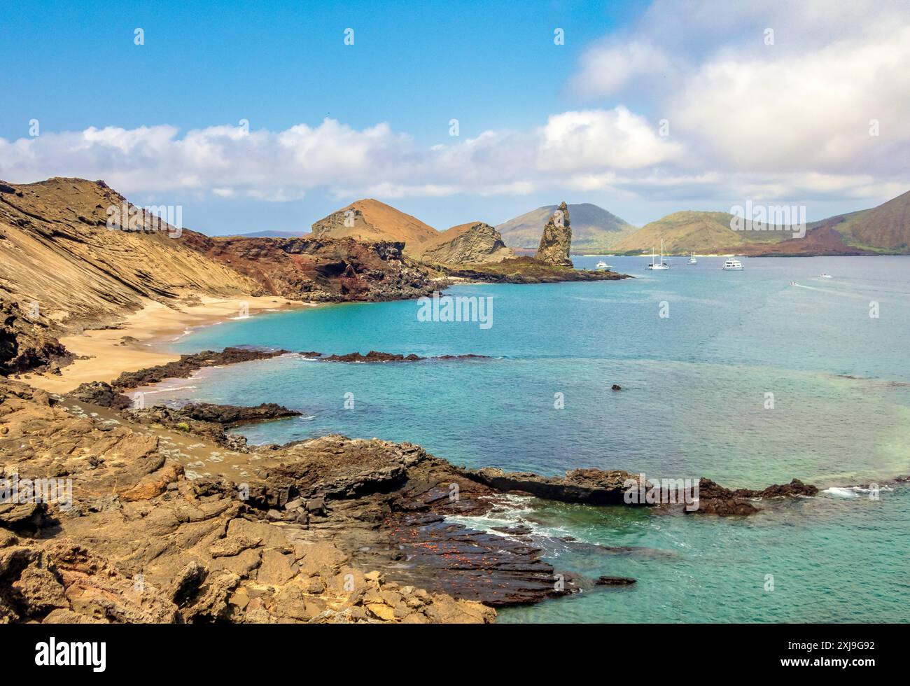 Bartolome Island with Pinnacle Rock, a volcanic plug, to the right ...