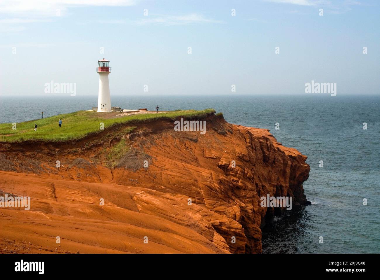 Lighthouse on the sandstone cliffs of Etang-du-Nord cape, Cap aux ...