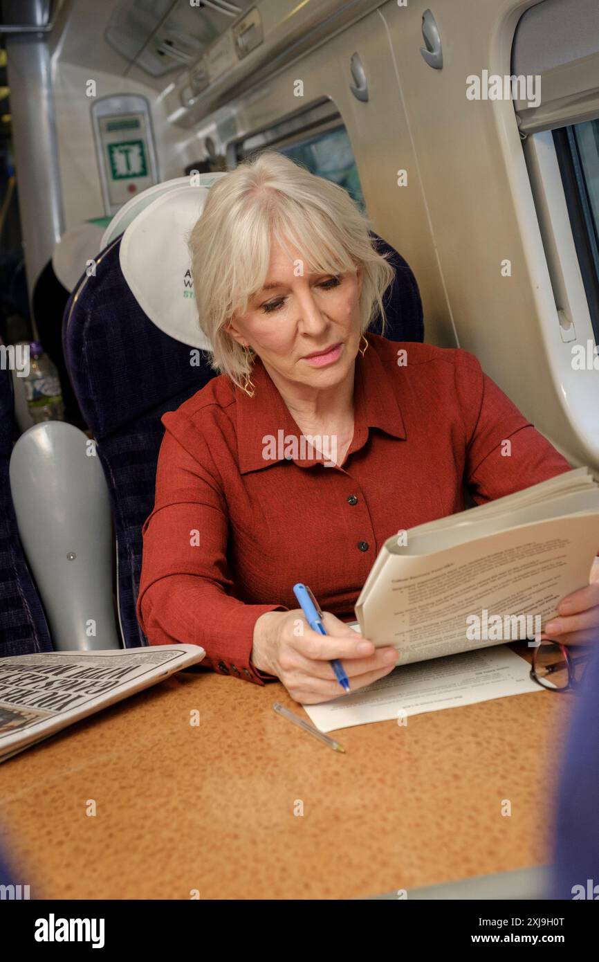Nadine Dorries Conservative MP until 2023 pictured on a train to her ...