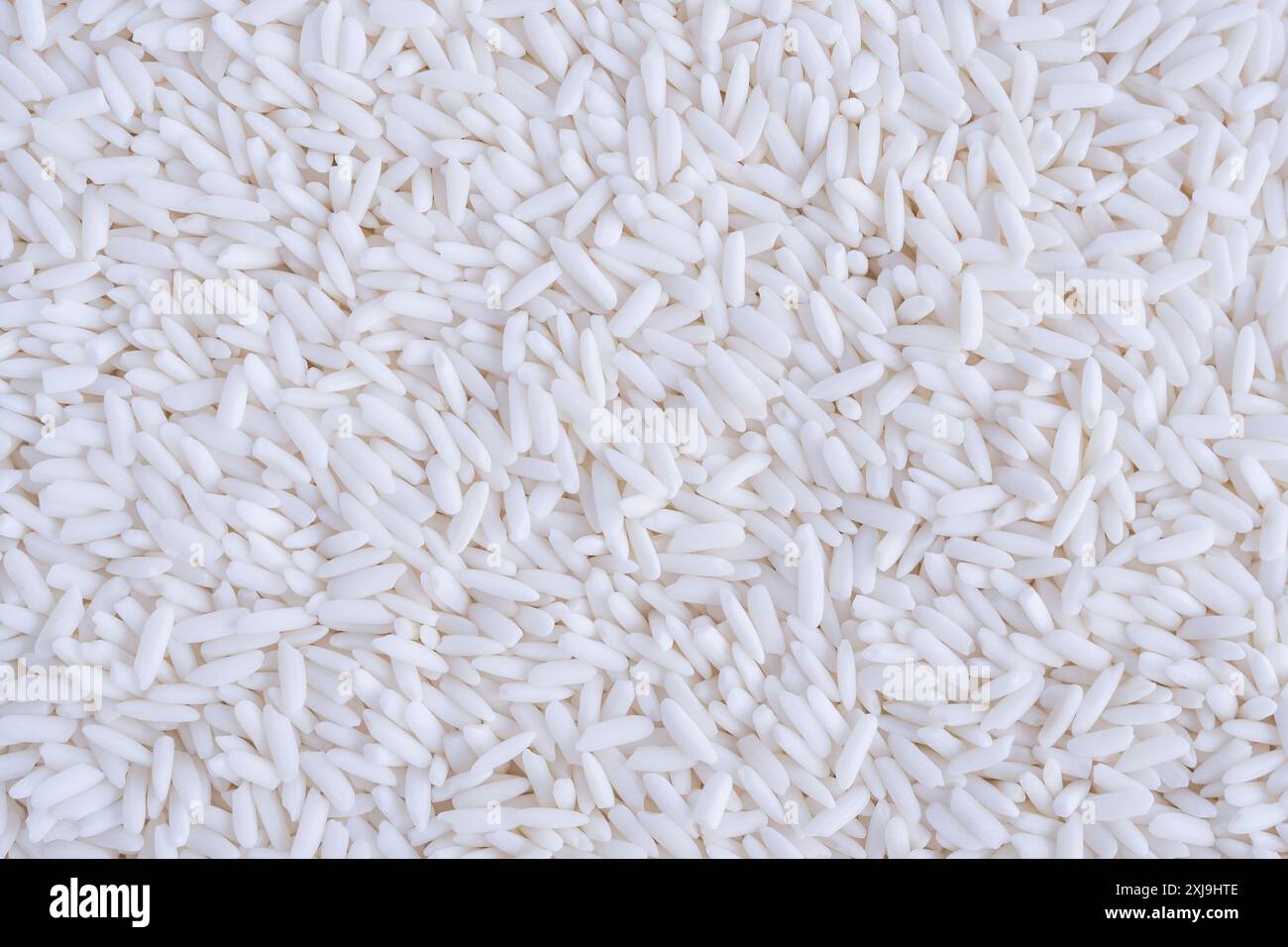 Thailand white glutinous sticky rice texture background Stock Photo - Alamy
