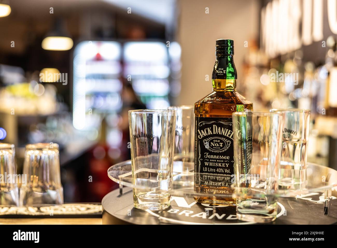 Siofok, Hungary. July 08. 2024. A bottle of Jack Daniels with glasses ...