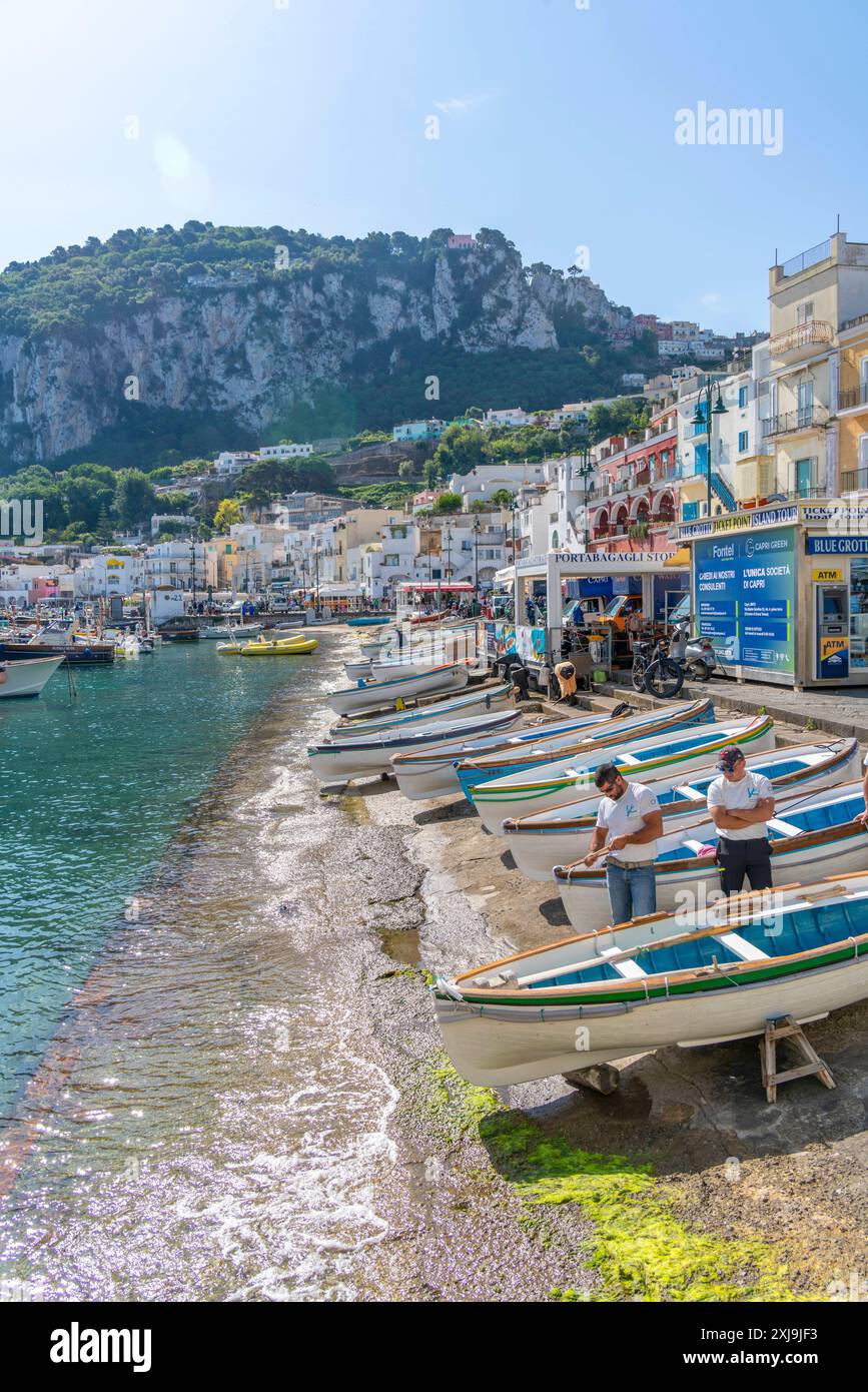 View of boats in Marina Grande overlooked by Capri Town in the ...