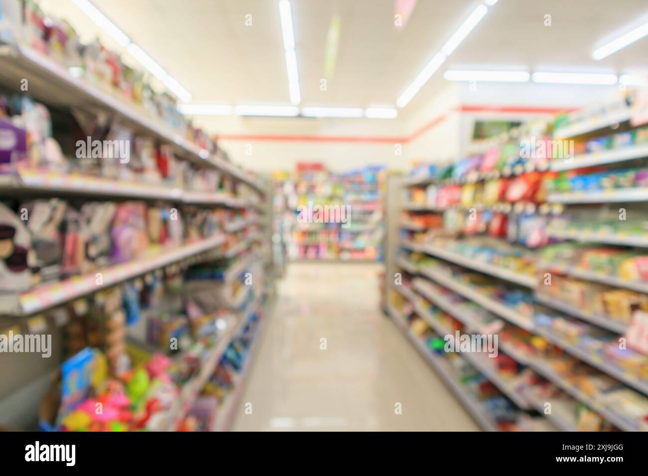 convenience store shelves interior blur for background Stock Photo - Alamy