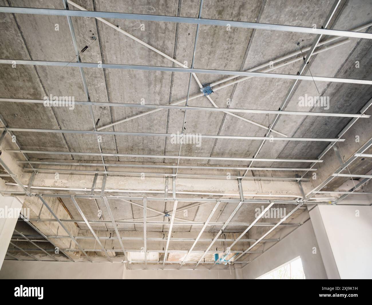 Install metal frame for plaster board ceiling at house under ...