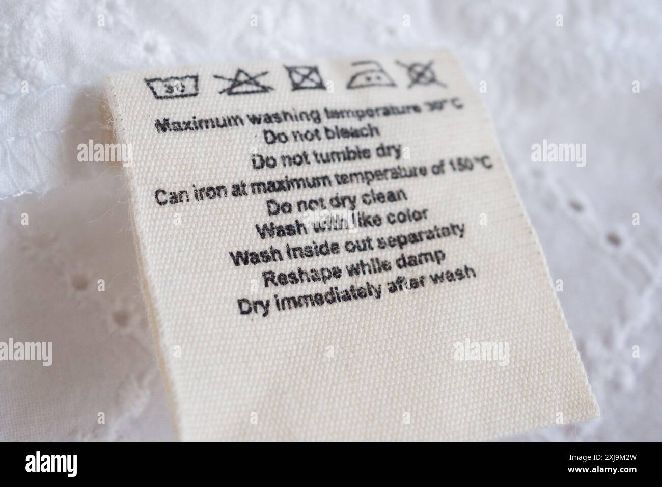 Clothing washing instructions label macro hi-res stock photography and ...