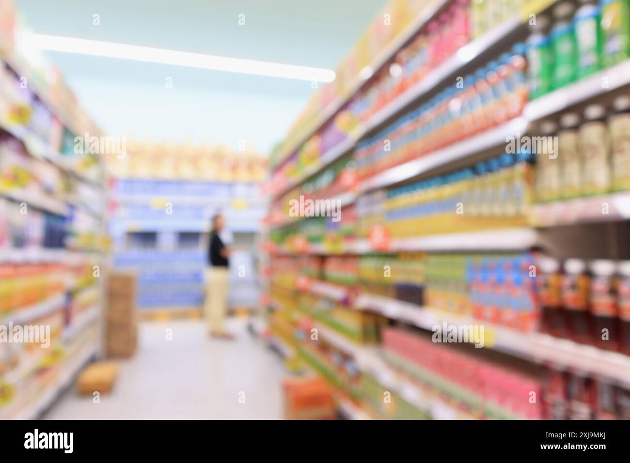 Abstract blur supermarket aisle background Stock Photo - Alamy