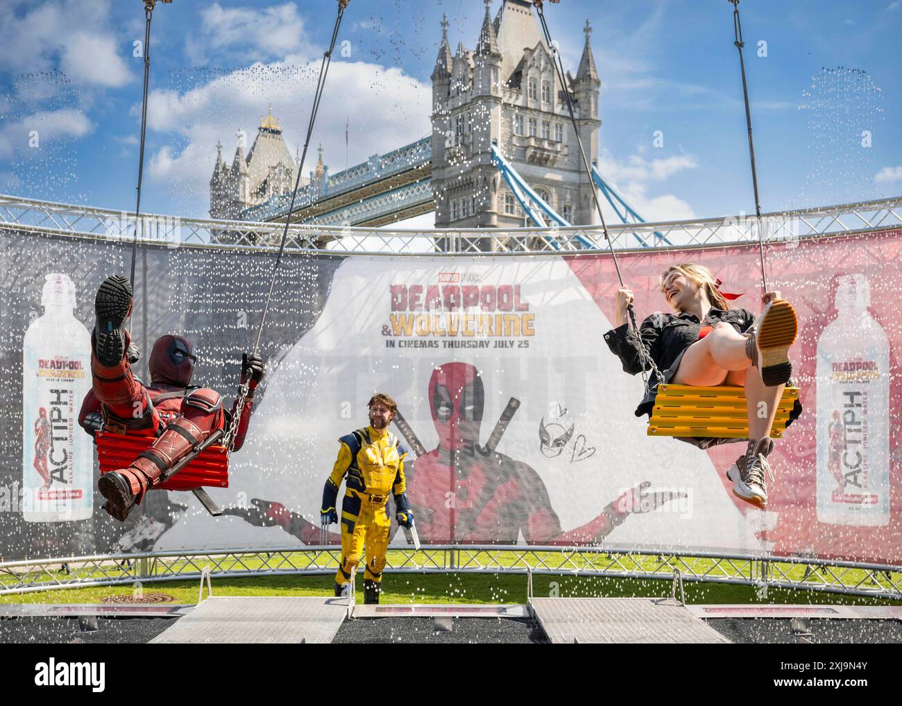 EDITORIAL USE ONLY Superfans Steve Parker dressed as Deadpool and Naomi ...