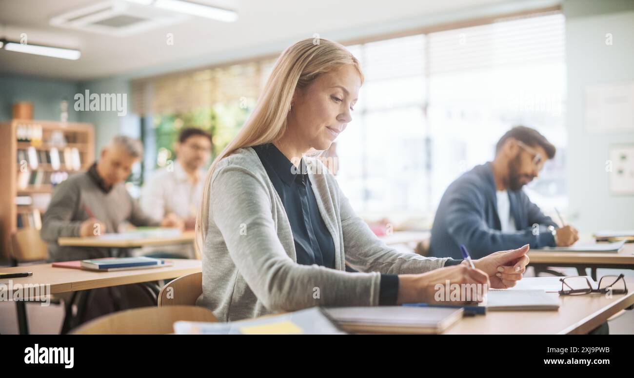 Diverse Group of Multiethnic Young and Senior Adults Sitting in ...