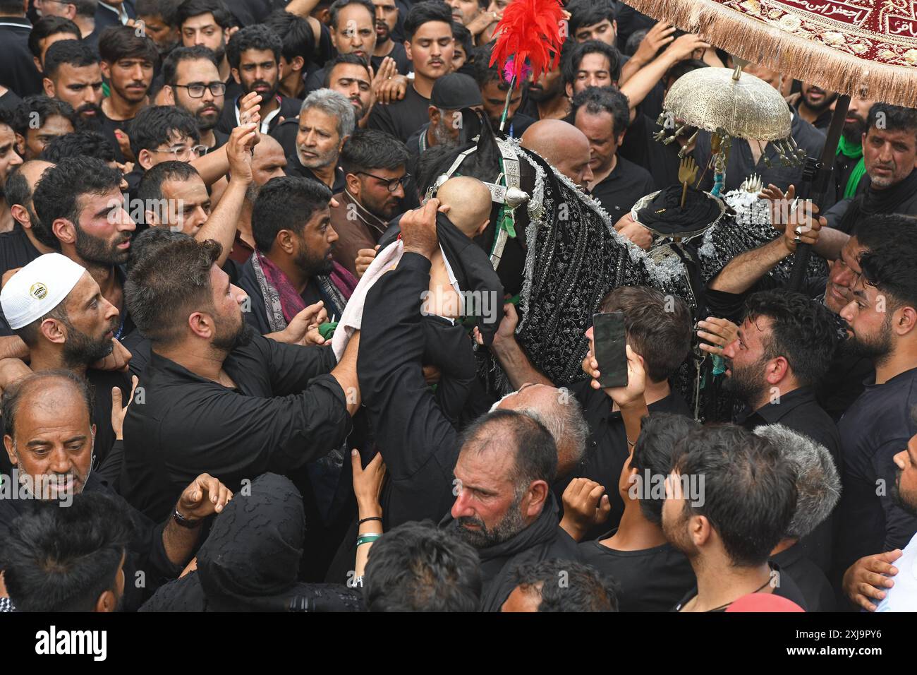 Srinagar, Jammu And Kashmir, India. 17th July, 2024. Shiite Muslims ...
