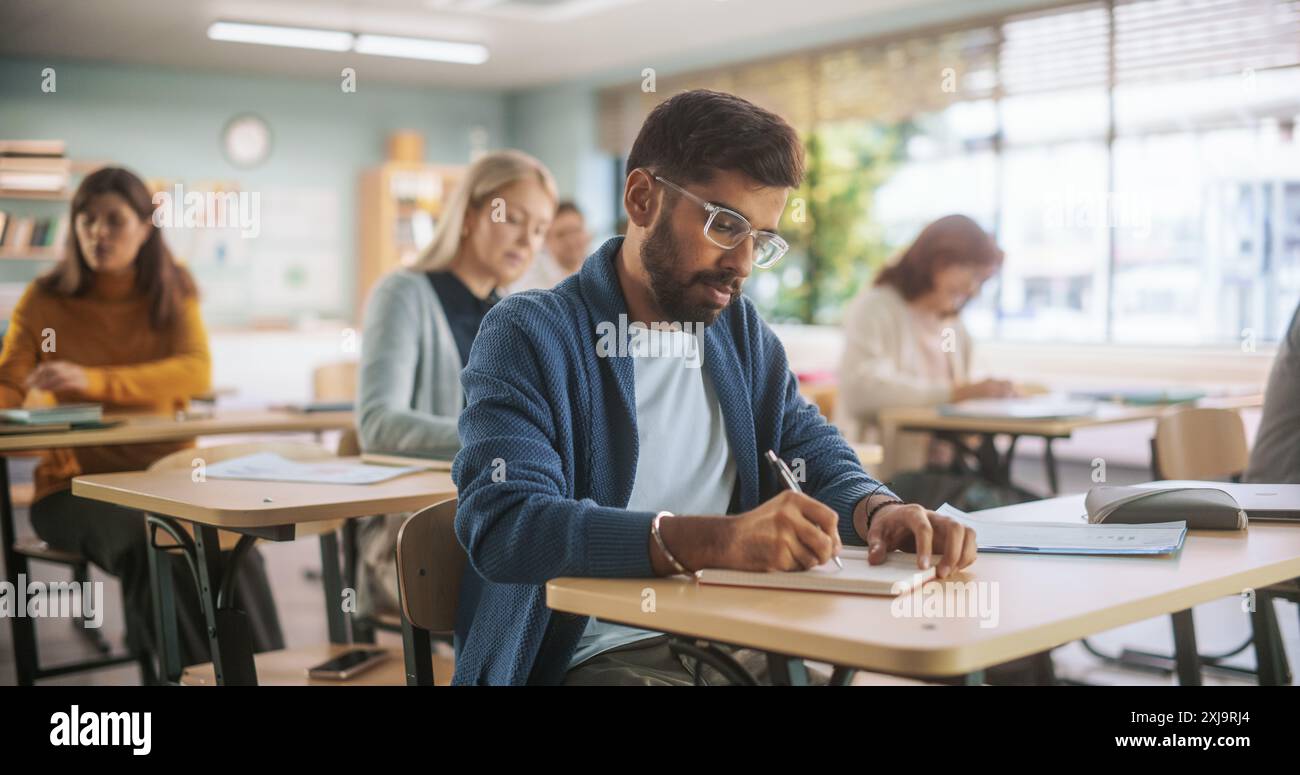 Multiethnic Indian Man Acquiring New Academic Skills in Classroom with ...