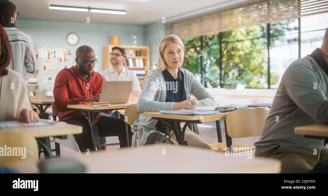 Grown Up Men and Women Getting Specialty Knowledge on an Evening Course ...