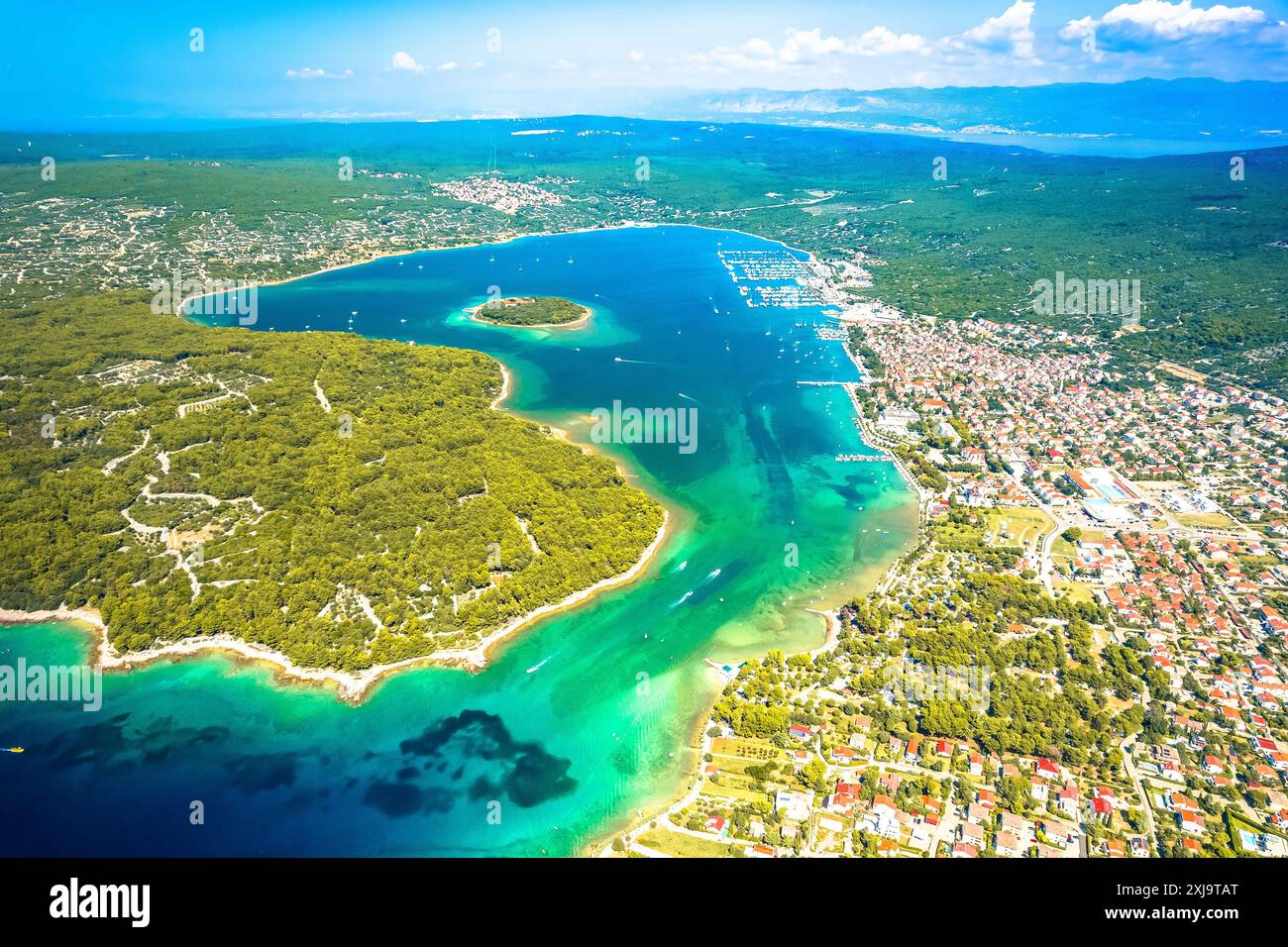Punat. Town of Punat bay and Kosljun island aerial view, Island of Krk ...