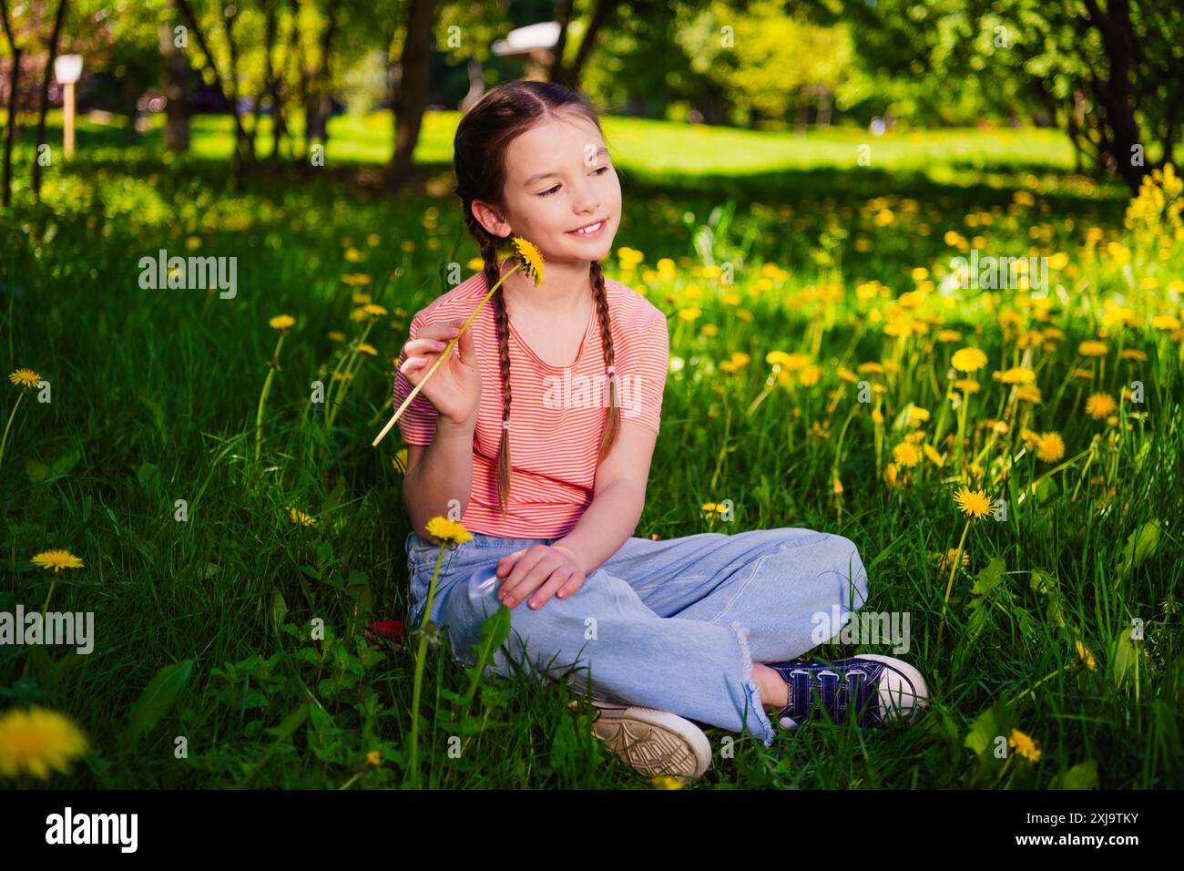 Full length photo of adorable little girl have fun outside activity ...
