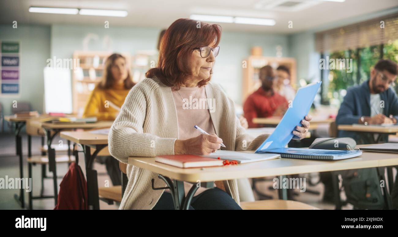 Grown Up Men and Women Getting Specialty Knowledge on an Evening Course ...