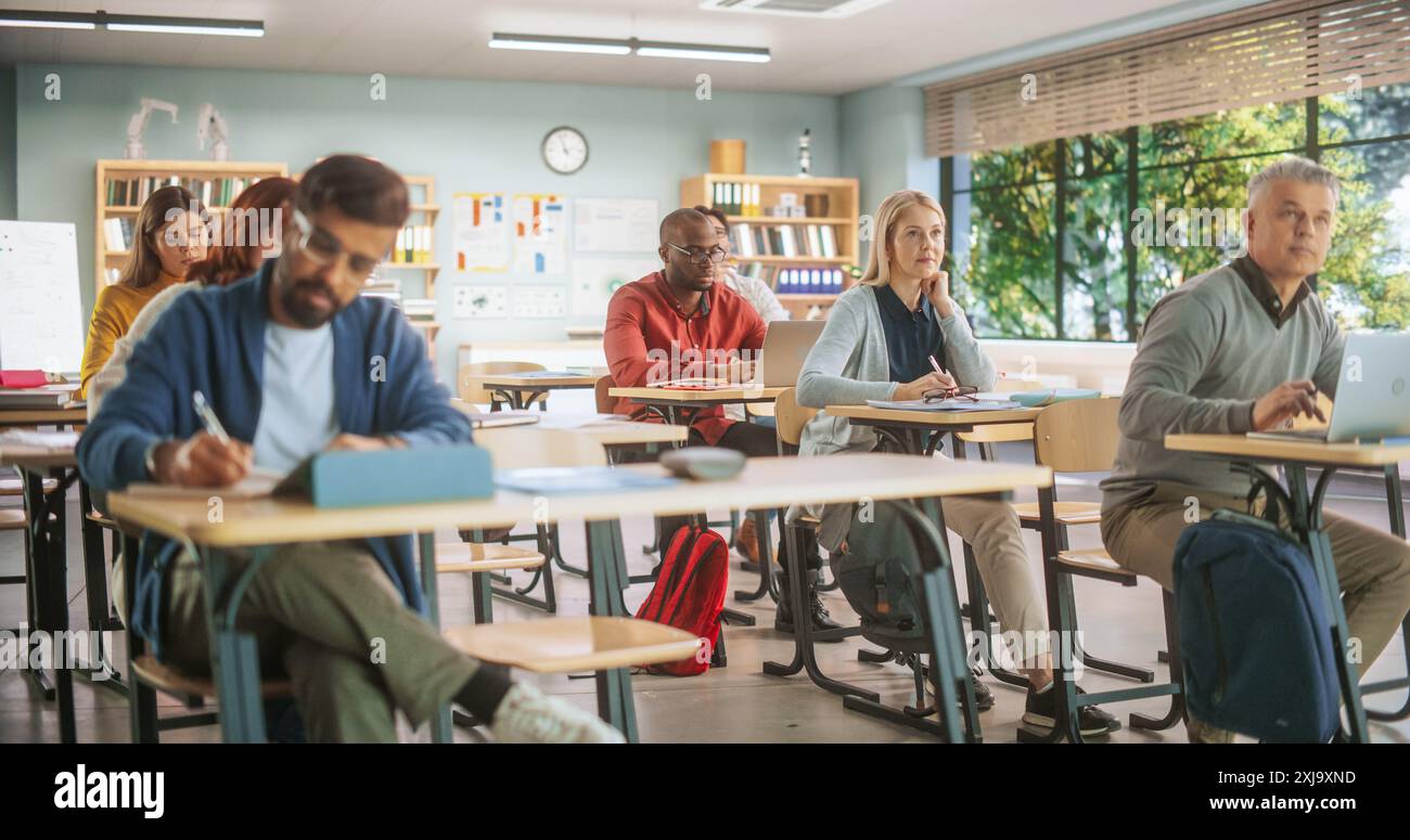 College students using laptops in class hi-res stock photography and ...