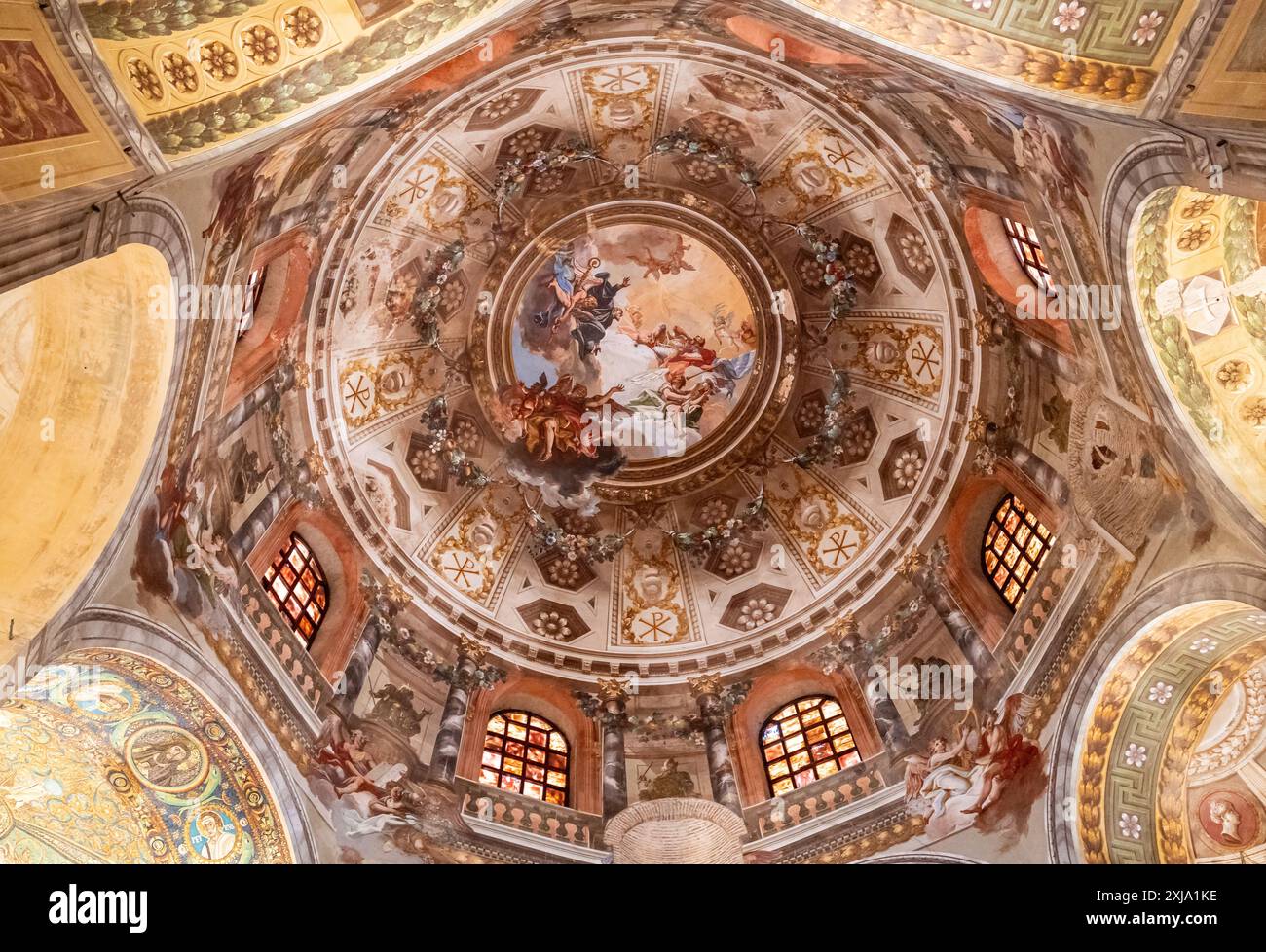View of frescoes decorating ceiling of catholic cathedral in Ravenna ...