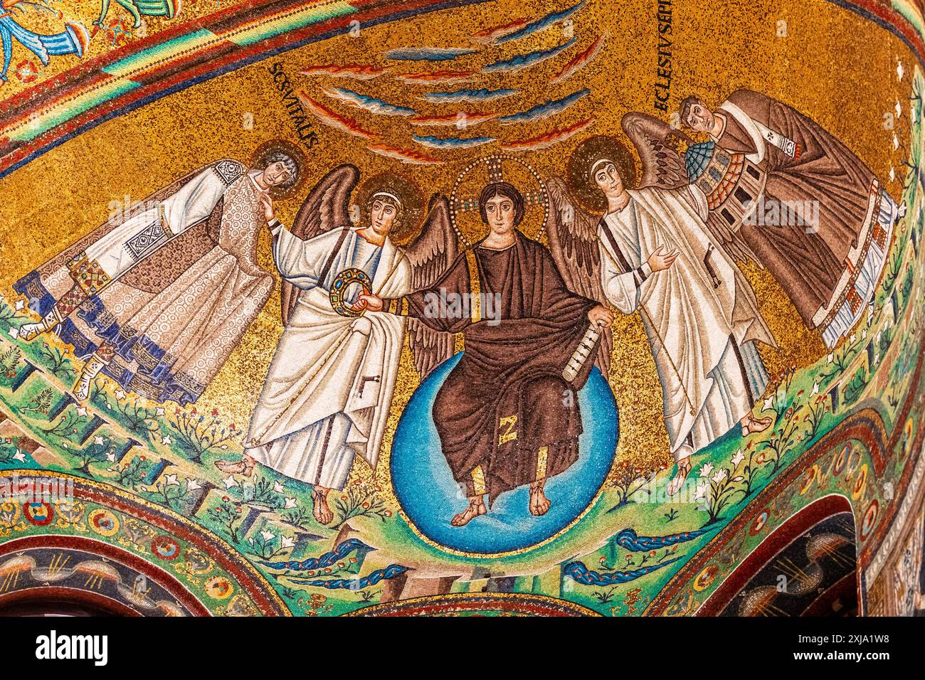 Close-up on colorful religious mosaic on italian church ceiling showing catholic saints with ...
