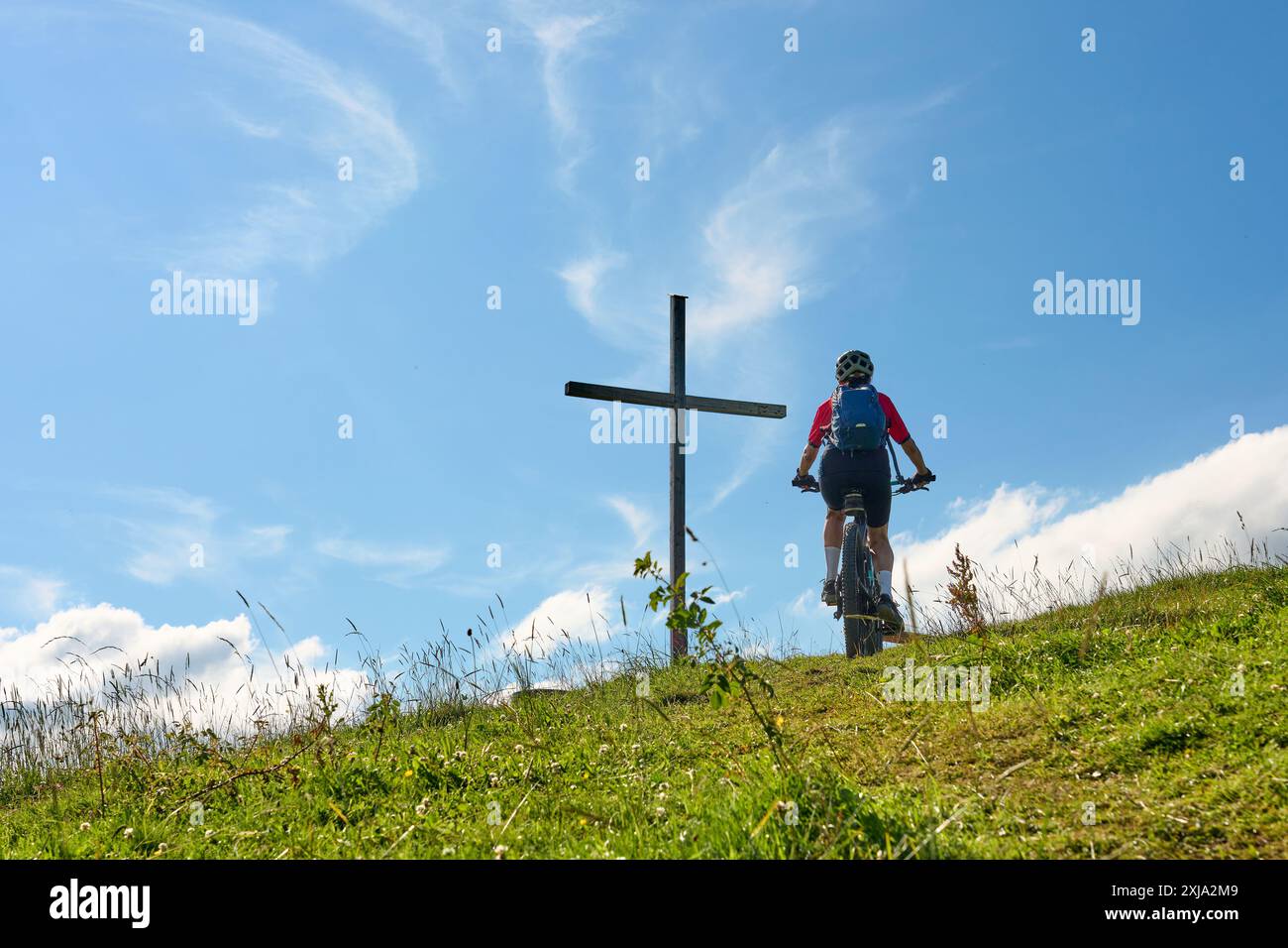 nice active senior woman riding her electric mountain bike in the ...