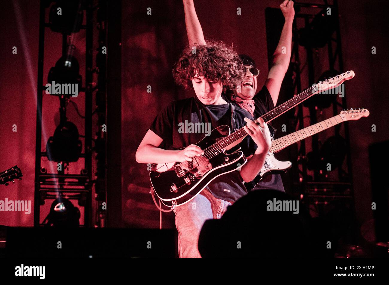 Roman Morello performing with Tom Morello at Peace & Friendship Stadium ...