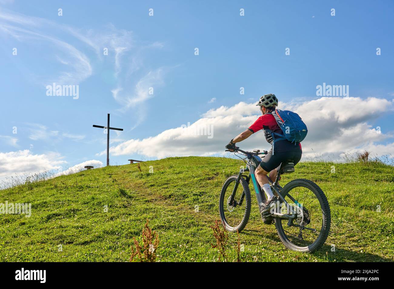 nice active senior woman riding her electric mountain bike in the ...