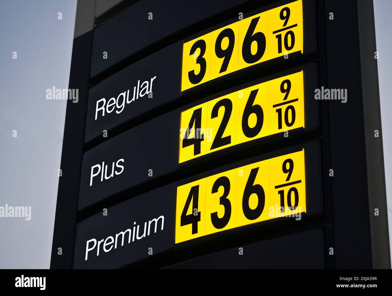 Illuminated sign, gas fuel prices at a filling station at dusk Stock ...