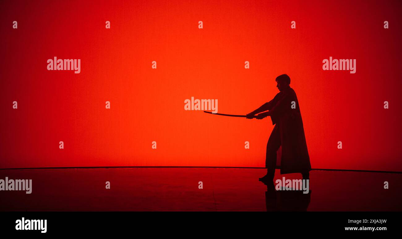 Athletic Man Practicing Kendo Martial Arts with a Katana or a Bamboo ...