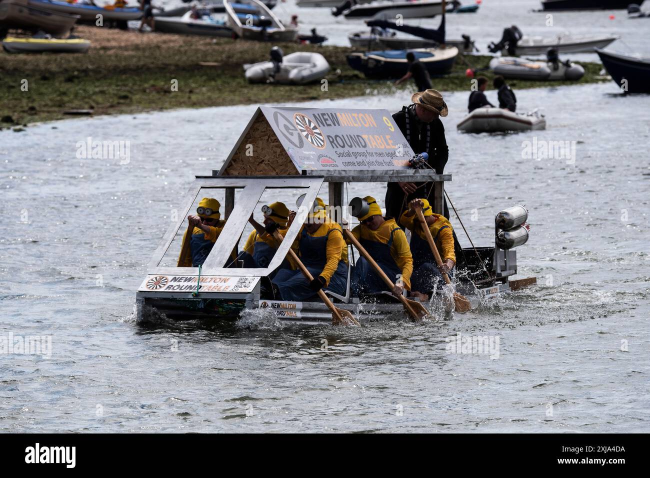 Mudeford RNLI fun day, charity event raft race in the harbour Stock ...