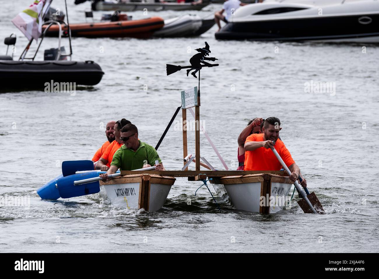 Mudeford RNLI fun day, charity event raft race in the harbour Stock ...