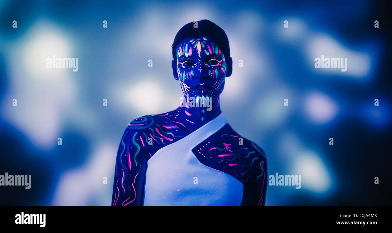 Captivating Beauty Shoot: Young Female Model with Neon Body Art Paint ...