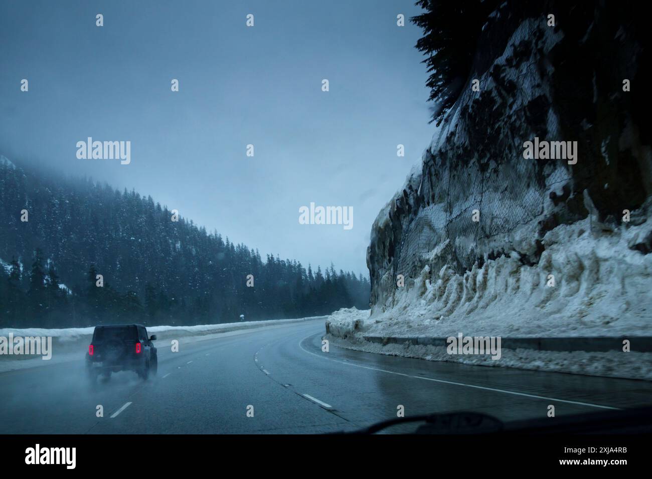 Driving on the rain and snow, Interstate 90, Snoqualmie Pass Stock ...