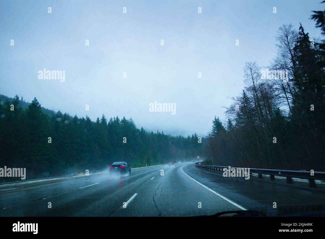 Driving on the rain and snow, Interstate 90, Snoqualmie Pass Stock ...