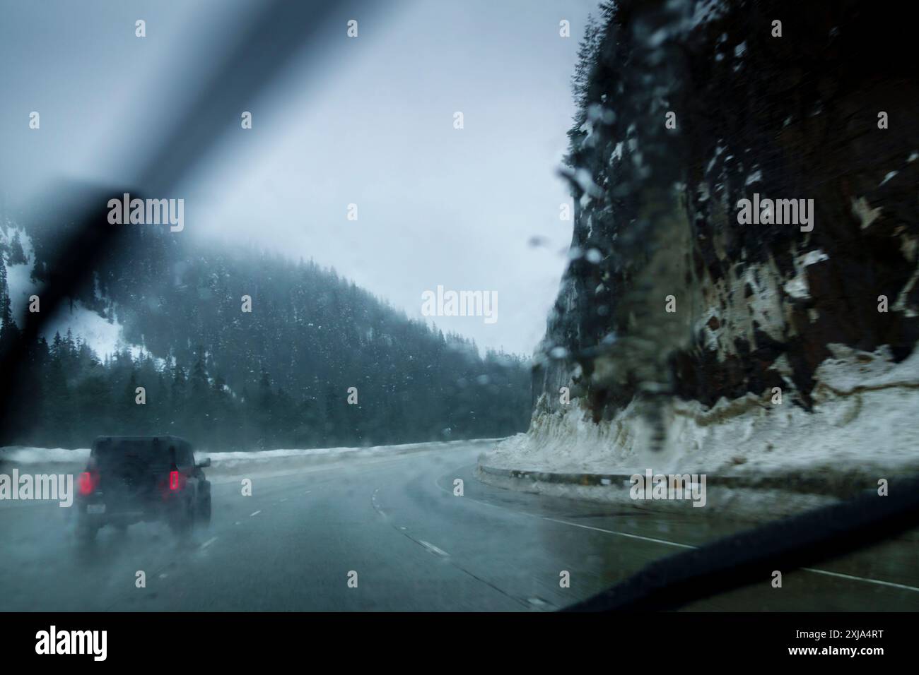 Driving on the rain and snow, Interstate 90, Snoqualmie Pass Stock ...