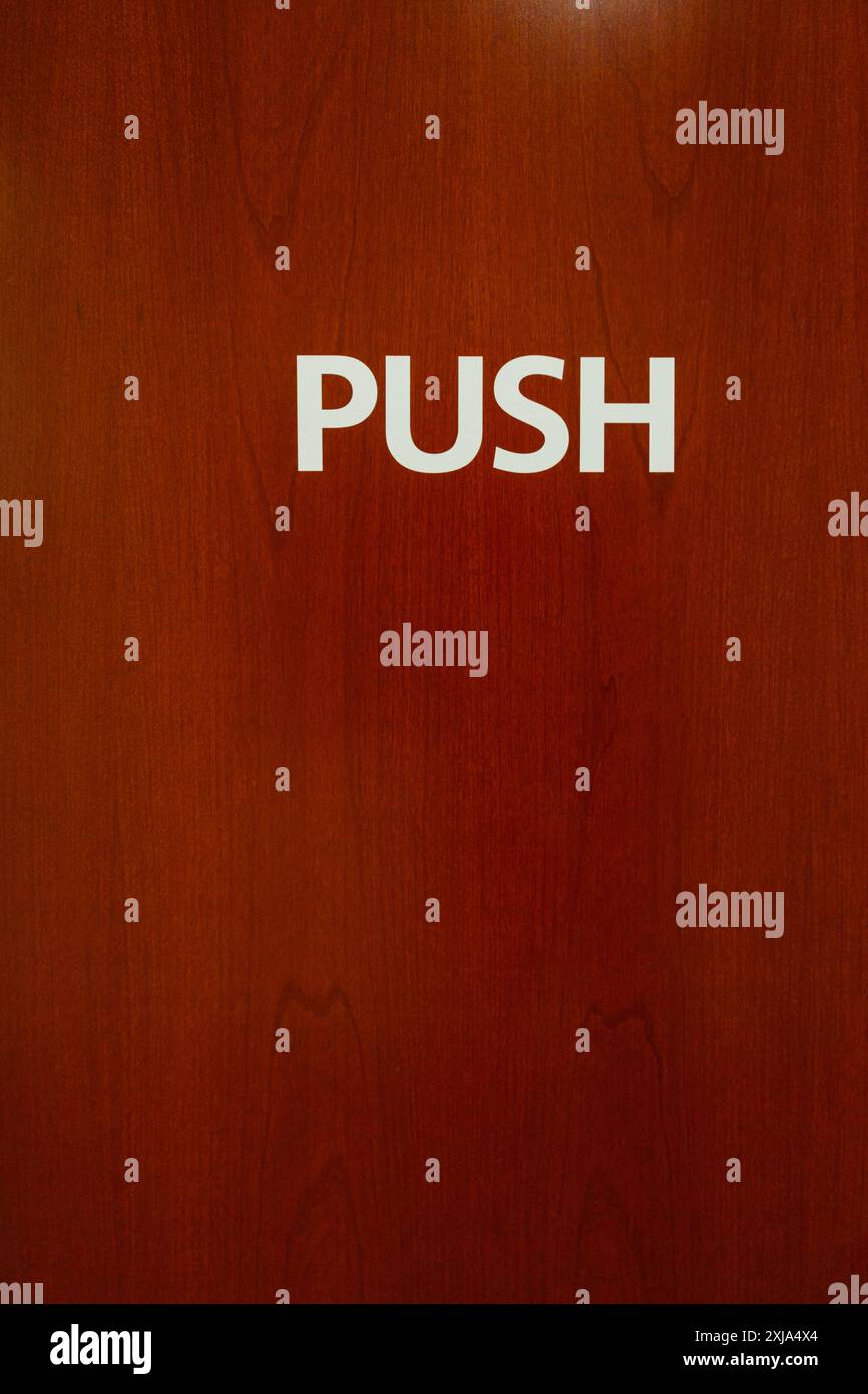 Push sign on wooden door, USA Stock Photo - Alamy