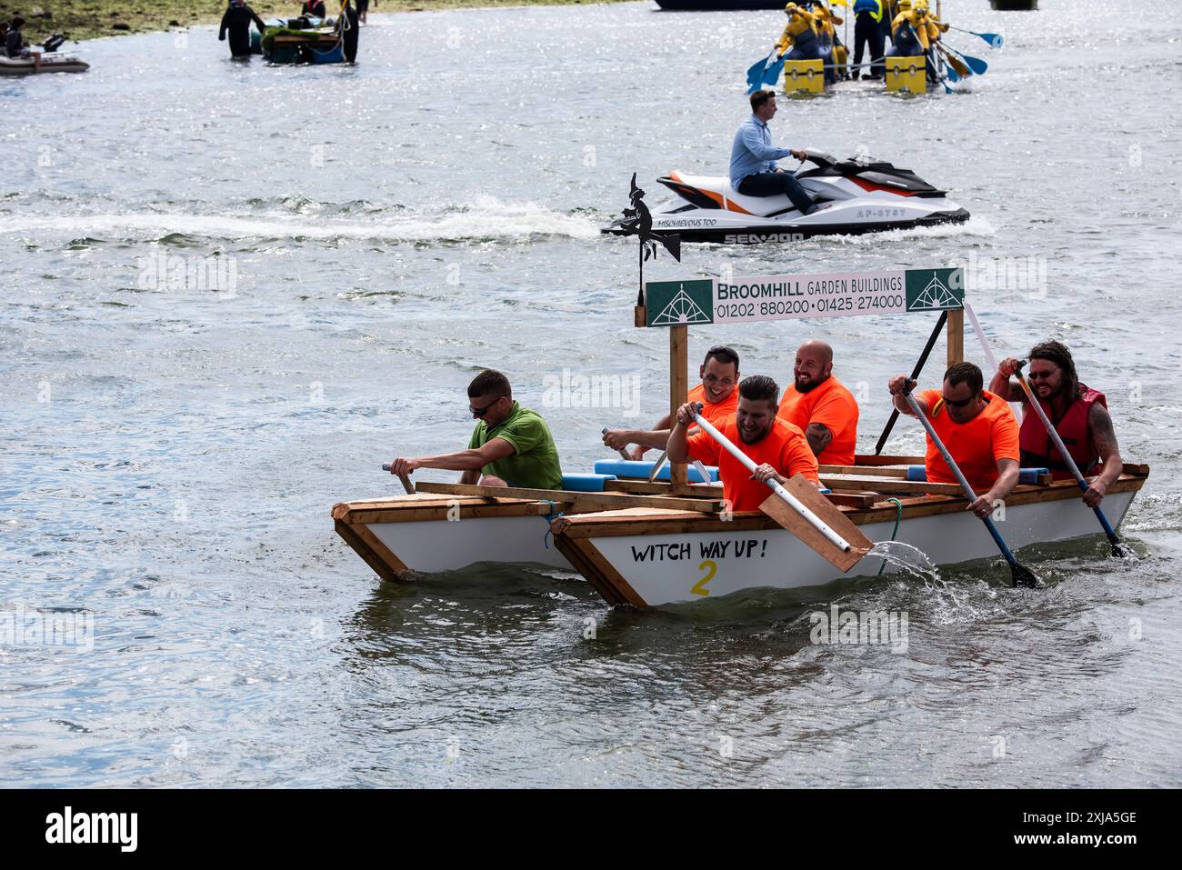 Mudeford RNLI fun day, charity event raft race in the harbour Stock ...