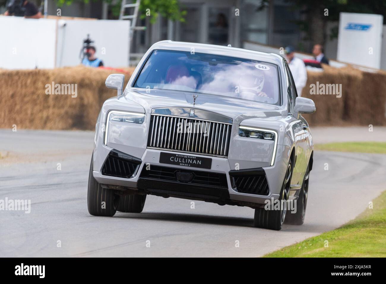 2024 Rolls-Royce Black Badge Cullinan Series II driving up the hill ...