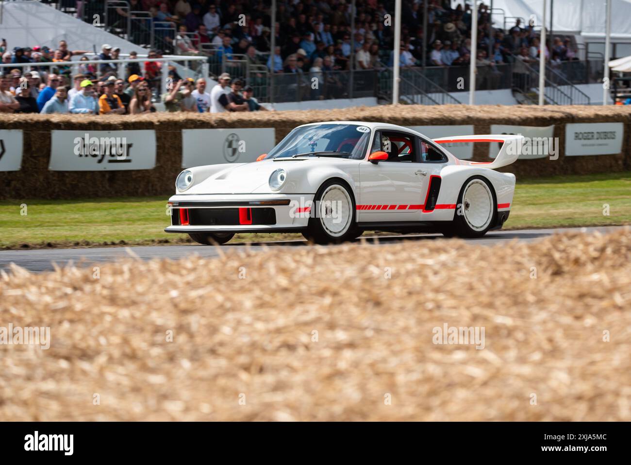 1991 Porsche 911 Reimagined by Singer driving up the hill climb track ...