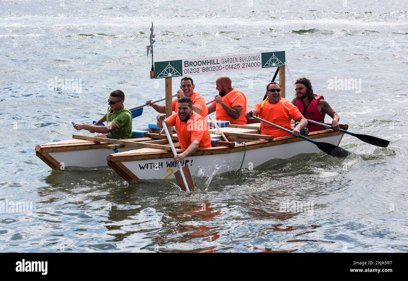 Mudeford RNLI fun day, charity event raft race in the harbour Stock ...