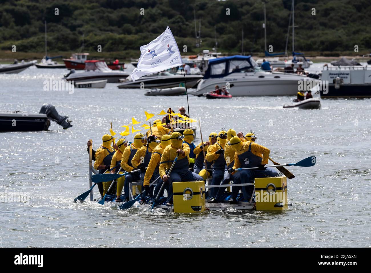 Mudeford RNLI fun day, charity event raft race in the harbour Stock ...