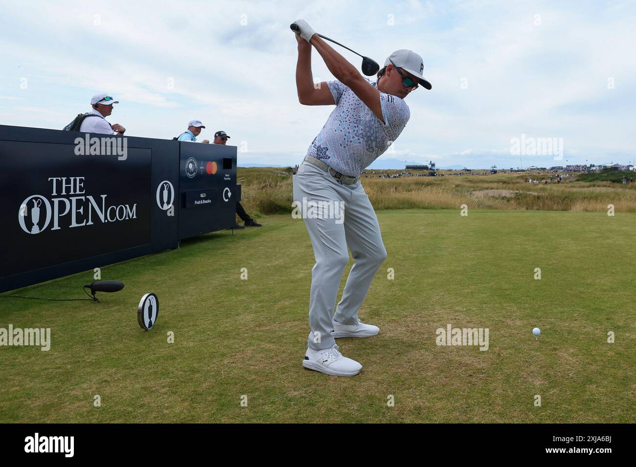 Rickie Fowler of the United States hits off the 13th tee during a ...