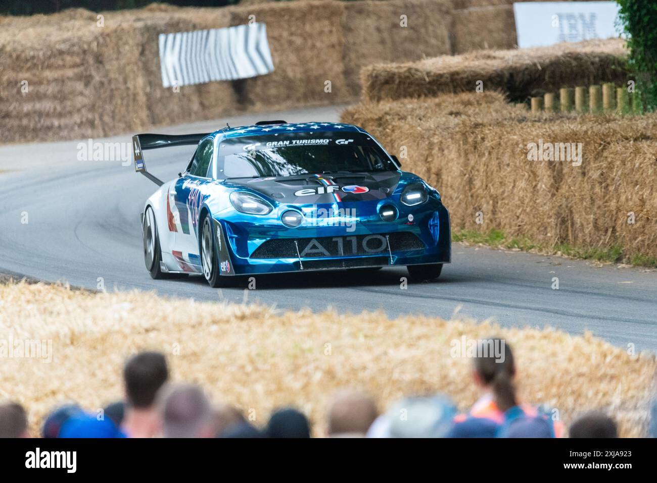 2024 Alpine A110 Pikes Peak car driving up the hill climb track at the ...