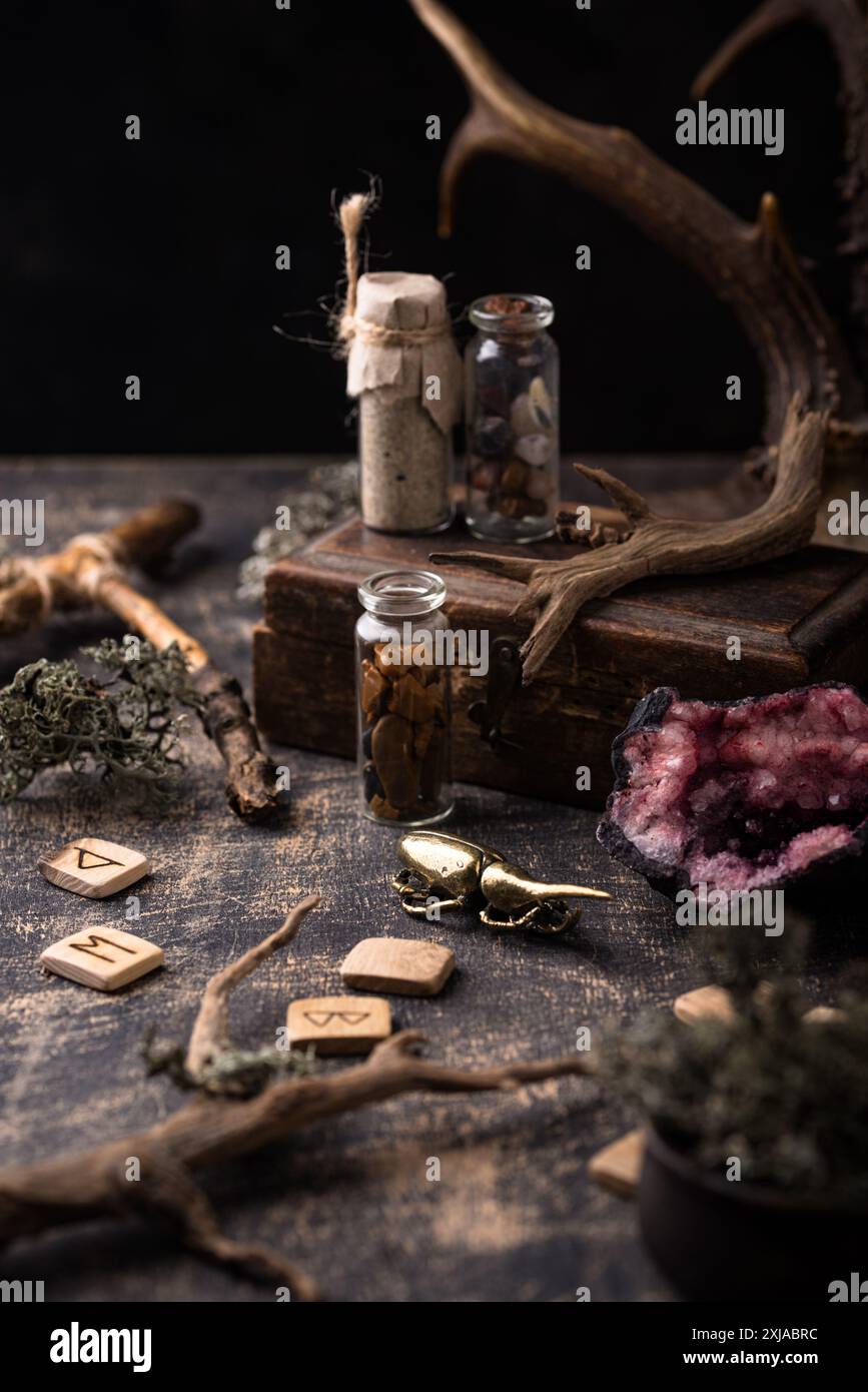 Esoteric magical background with runes Stock Photo - Alamy